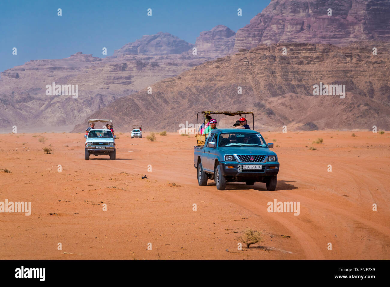 A tourist caravan in the Wadi Rum desert, Hashemite Kingdom of Jordan ...