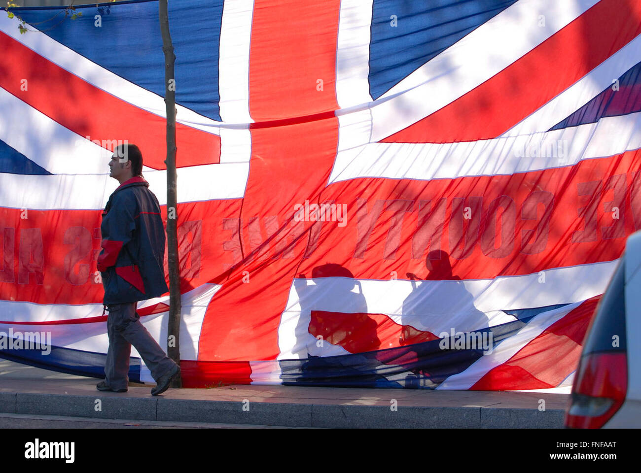 Tourist with Union Jack flag. Barcelona, Catalonia, Spain Stock Photo ...