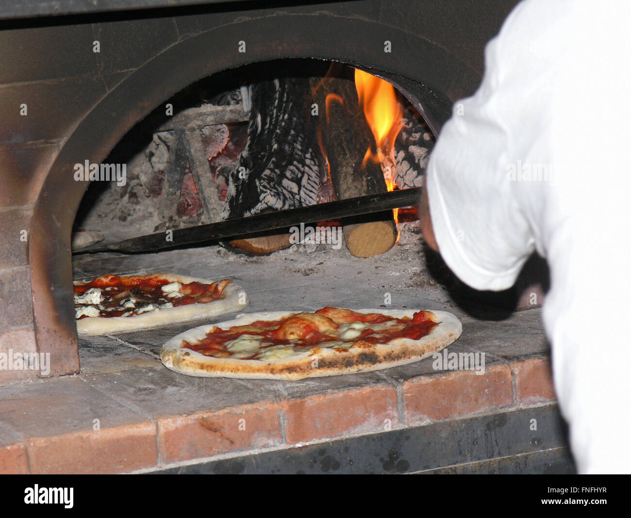 Pizza maker at work Stock Photo - Alamy