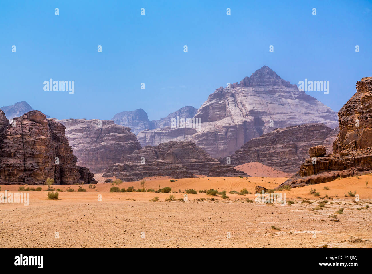 The Wadi Rum desert landscape of mountains and sand dunes in the ...