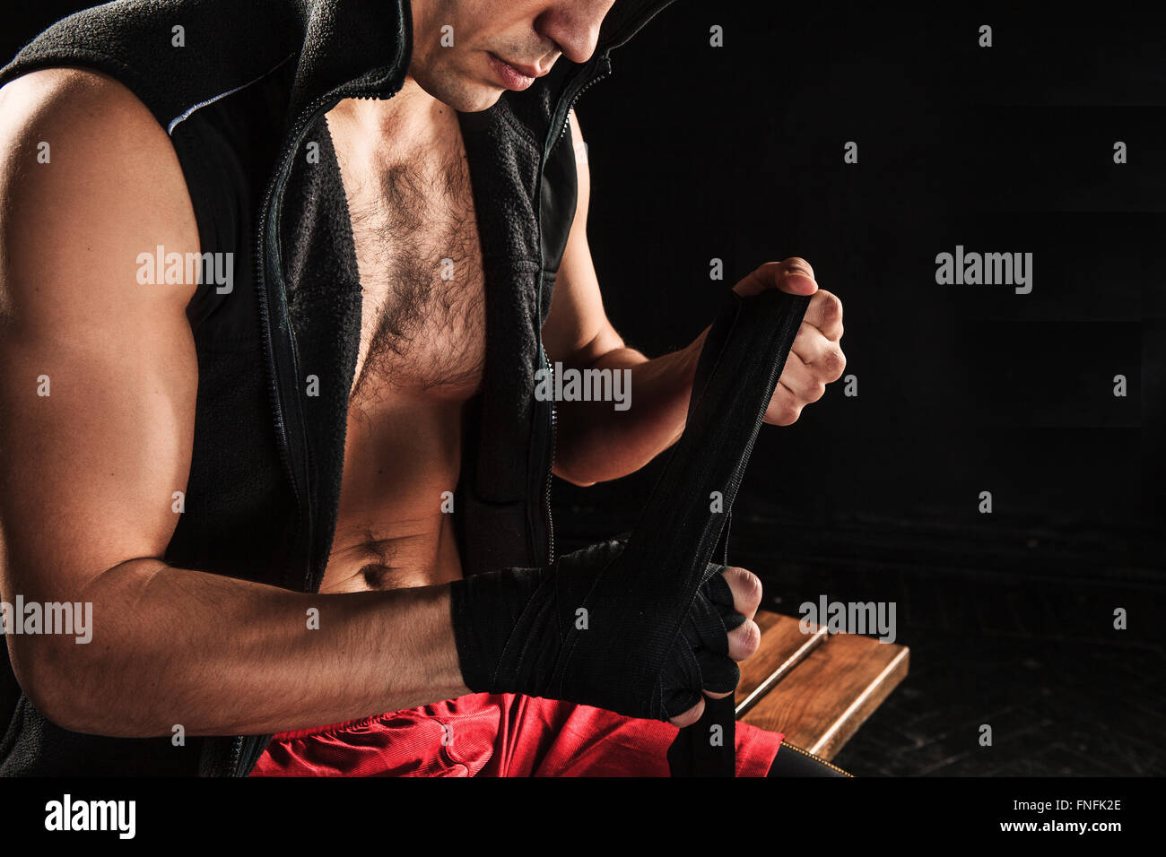 The hands of muscular man with bandage Stock Photo - Alamy