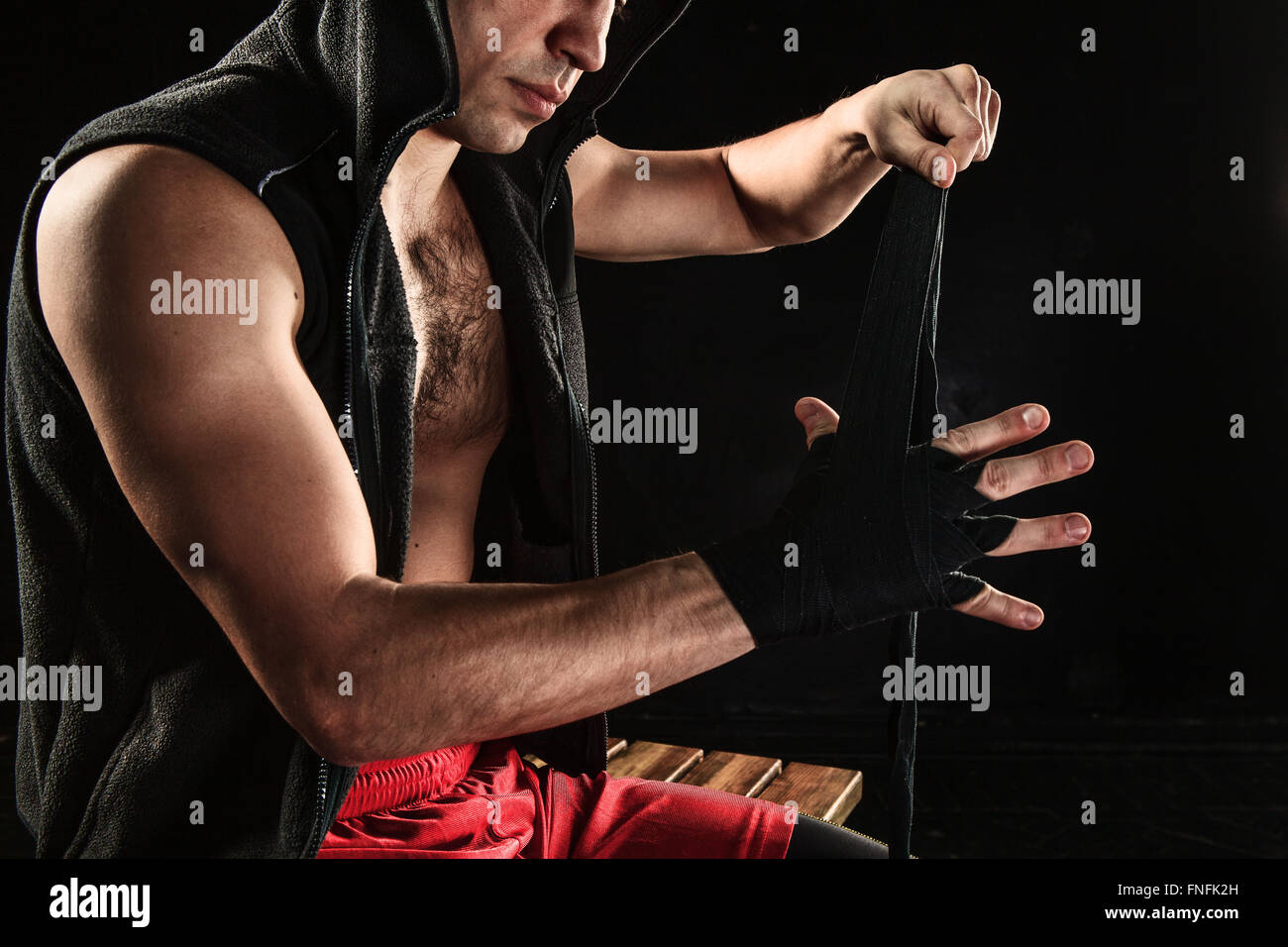 The hands of muscular man with bandage Stock Photo - Alamy