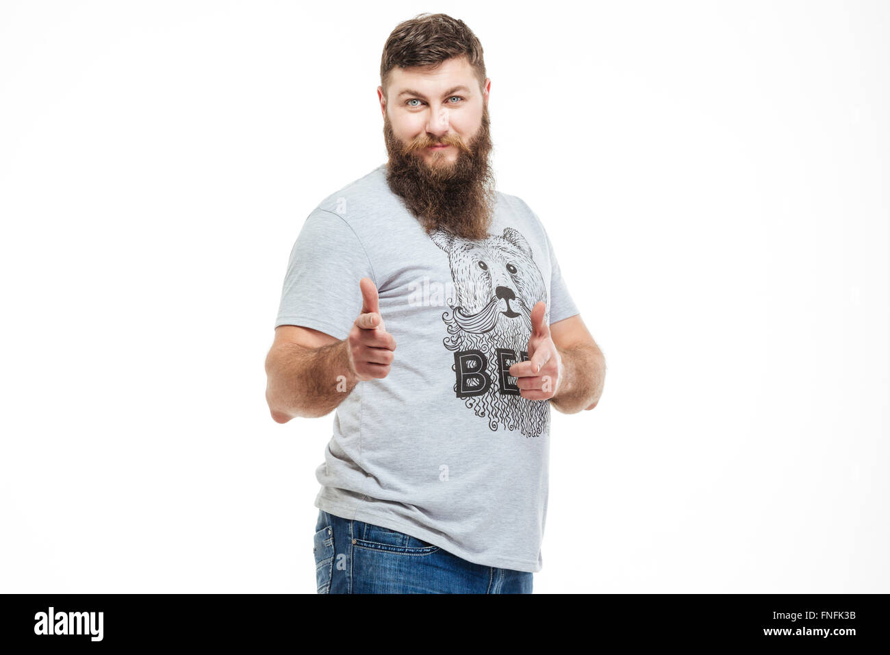 Happy bearded man pointing on young with both hands over white ...