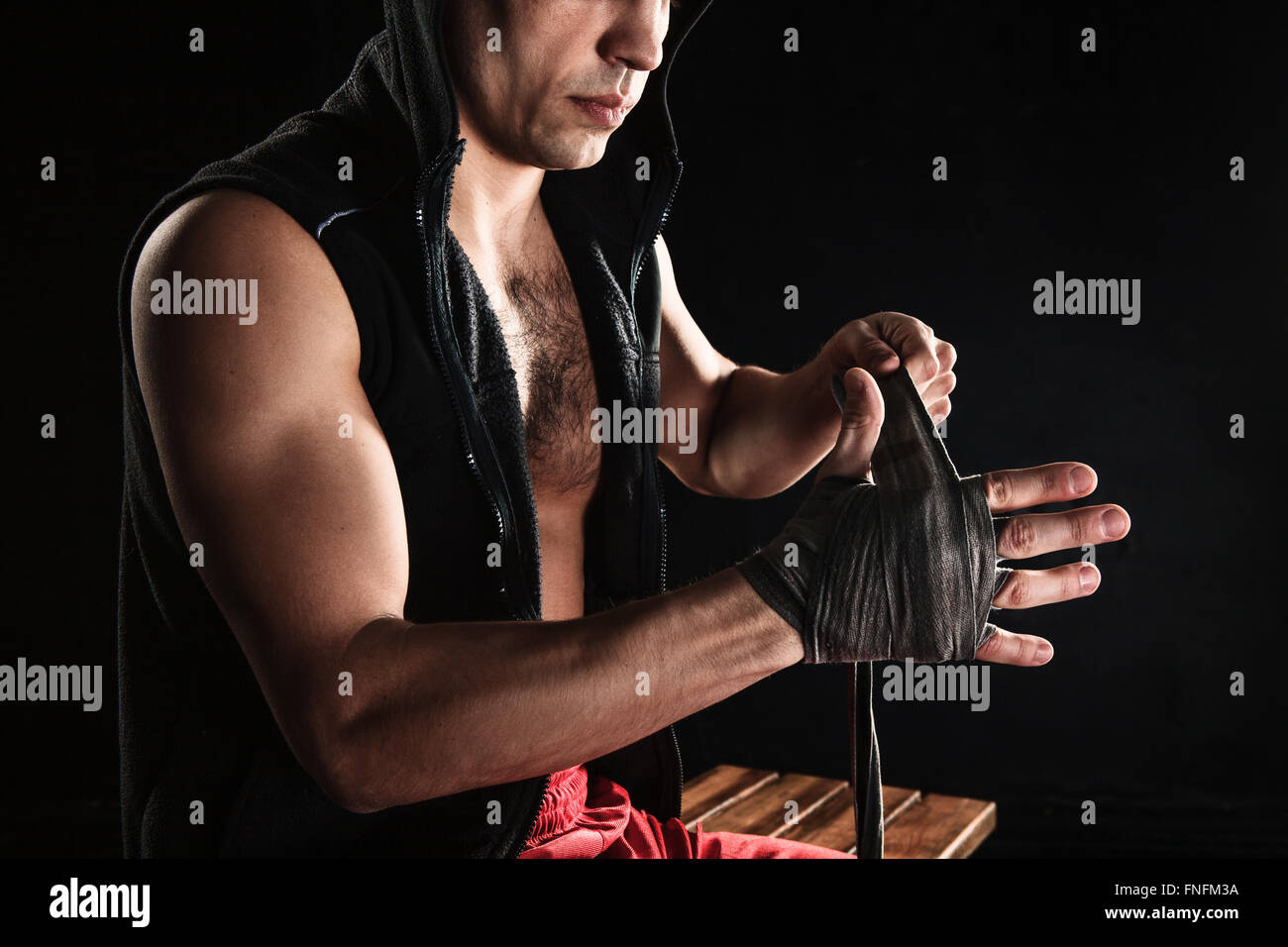 The hands of muscular man with bandage Stock Photo - Alamy