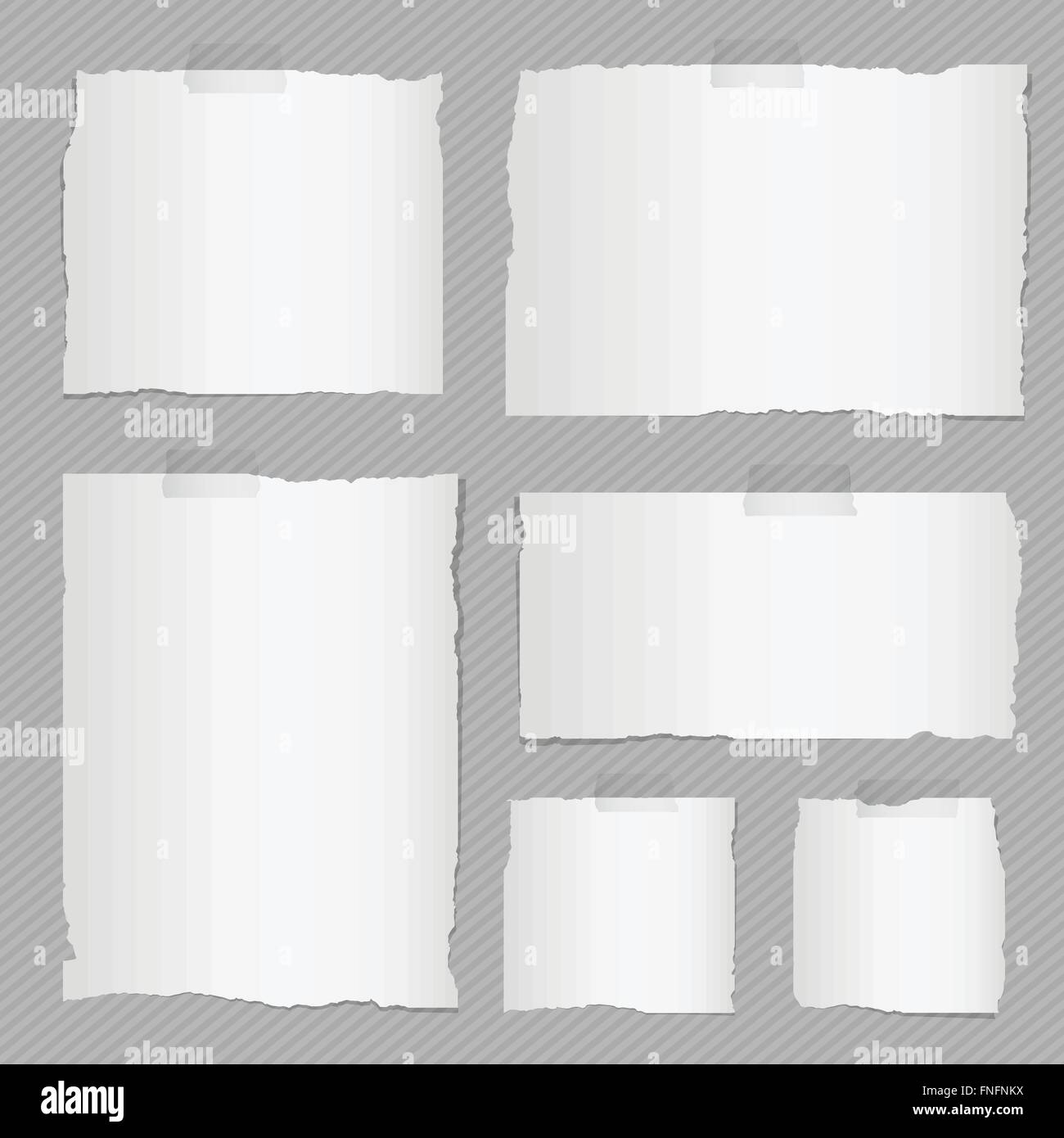Pieces of torn white squared notebook paper with sticky tape on brown ...