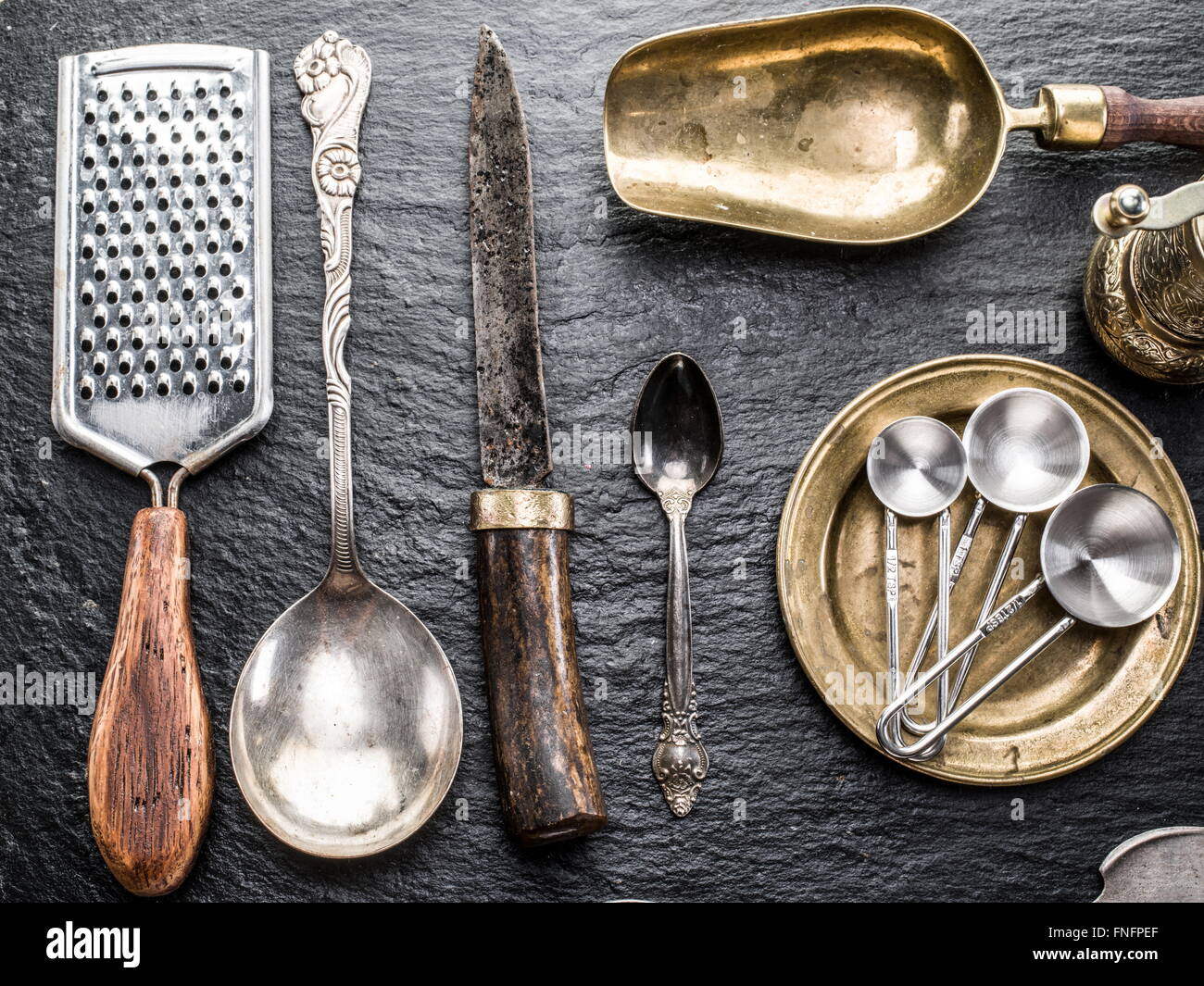 Kitchen utensils on the graphite background Stock Photo - Alamy