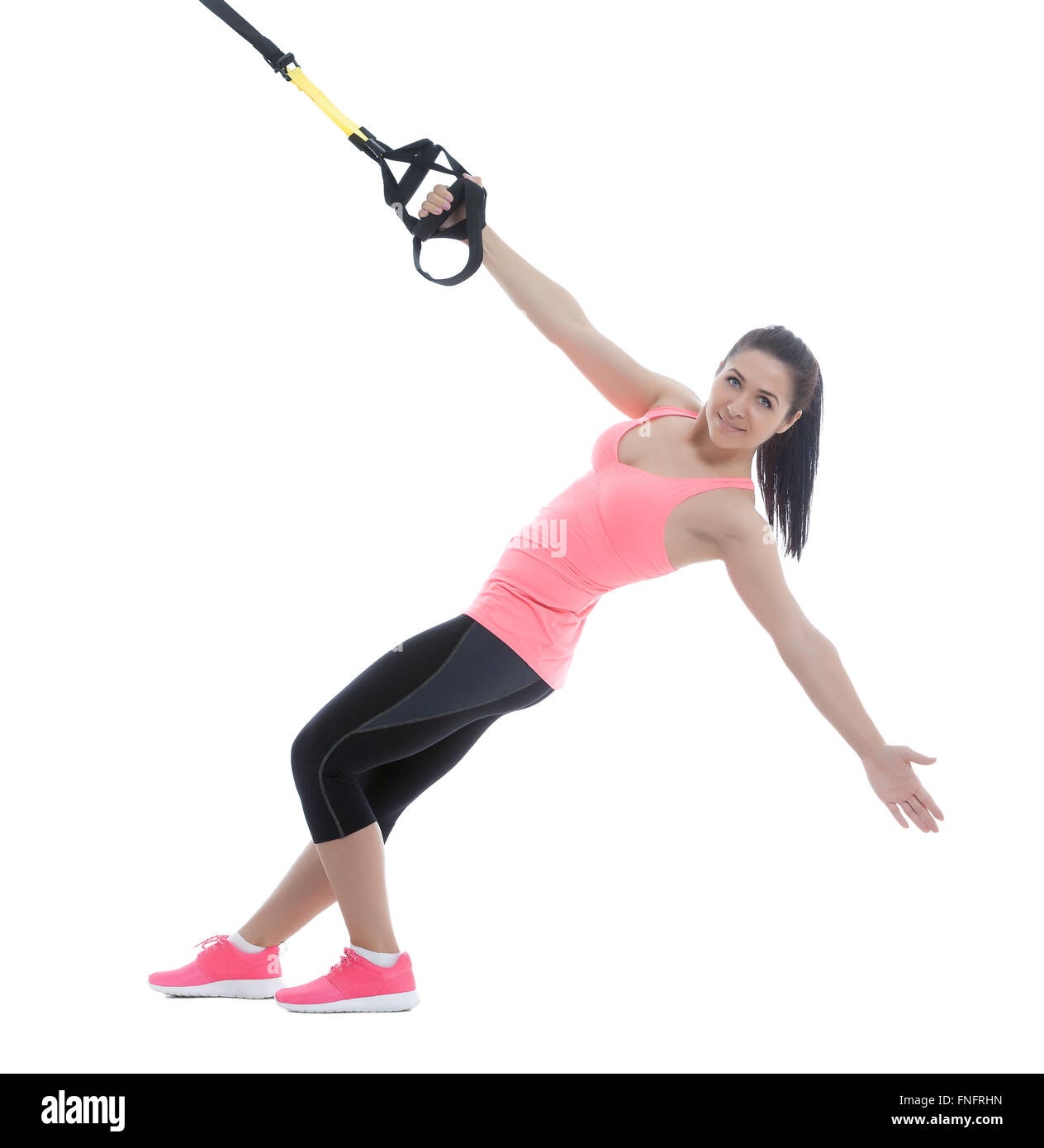 Athletic woman with functional loops for training isolated on white ...