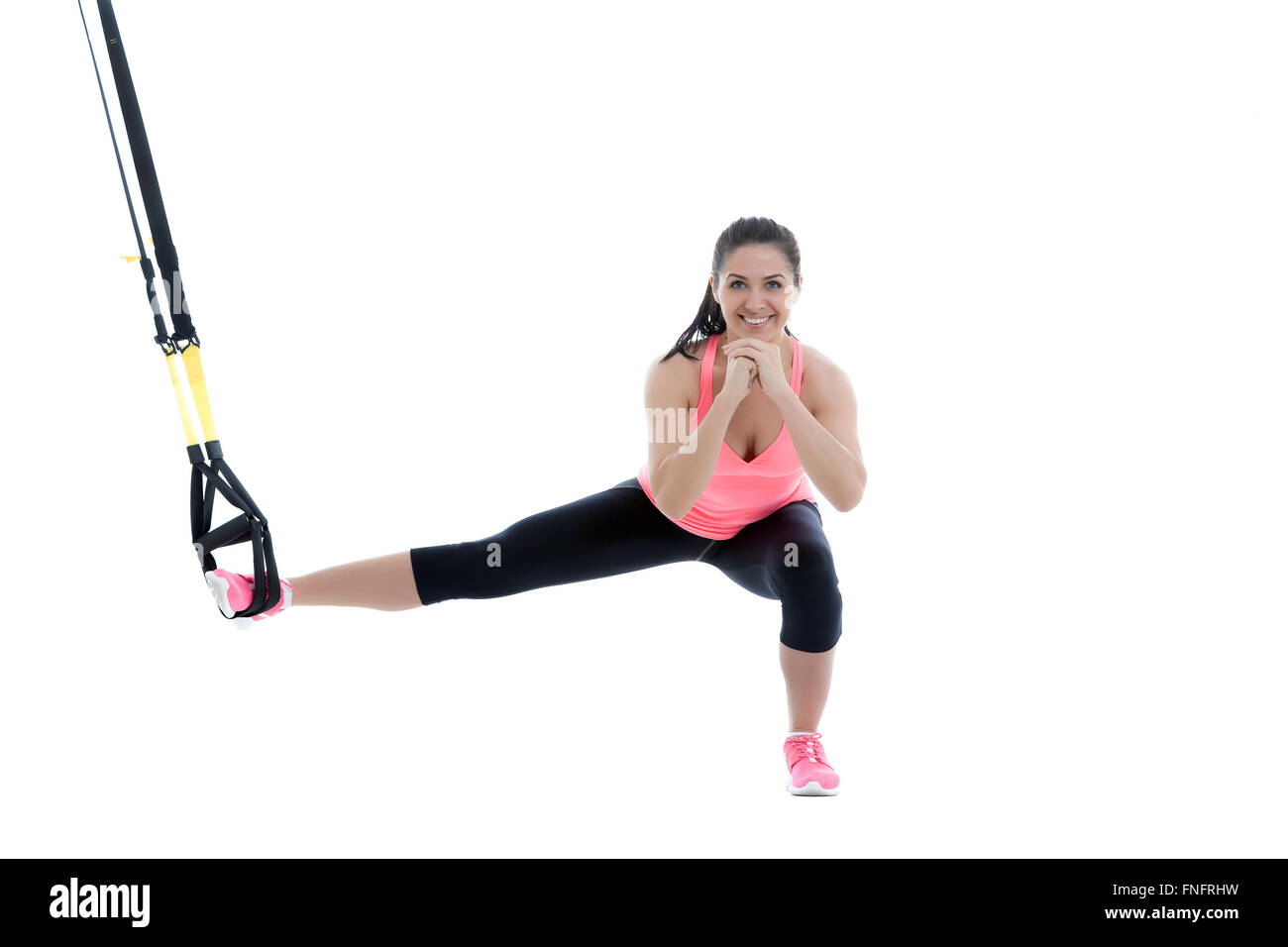 Athletic woman with functional loops for training isolated on white ...