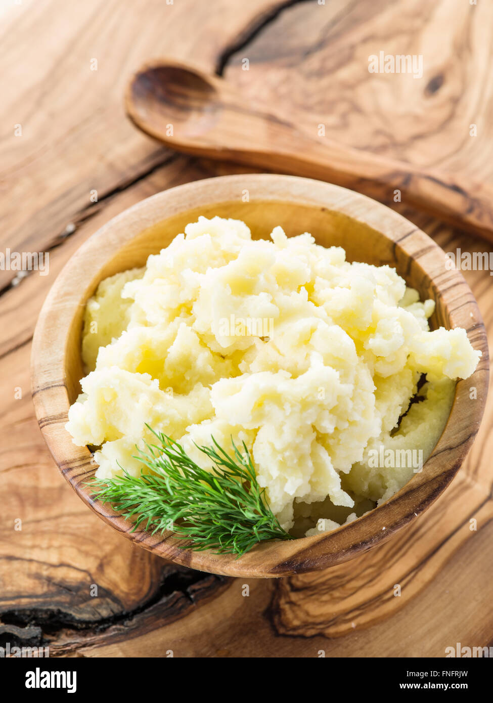 Mashed potatoes in the wooden bowl on the service tray Stock Photo - Alamy