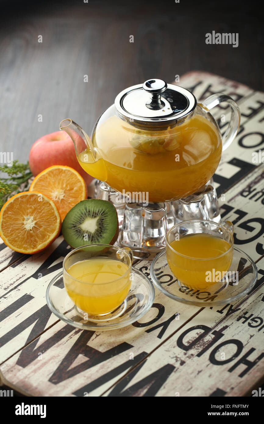 Fruit tea served in a teapot Stock Photo - Alamy