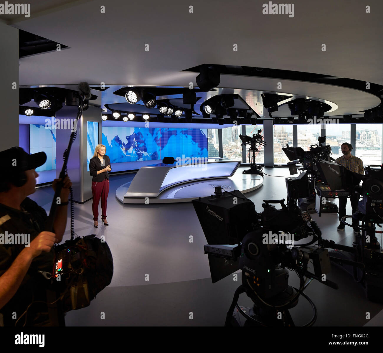 Cameras with news desk and studio beyond. Al Jazeera Studio at the ...