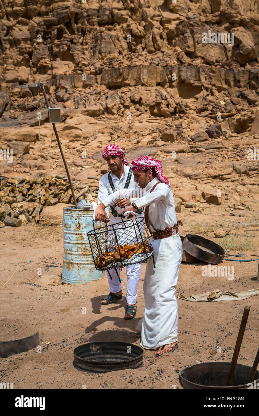 Preparing Zarb, a Bedouin meal in the Wadi Rum desert, Hashemite ...