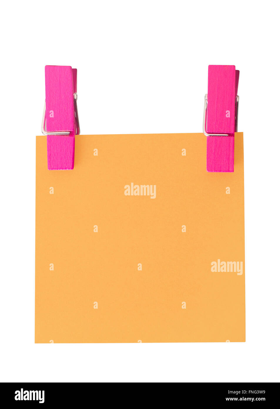 Orange paper note held by two pegs on white background Stock Photo - Alamy