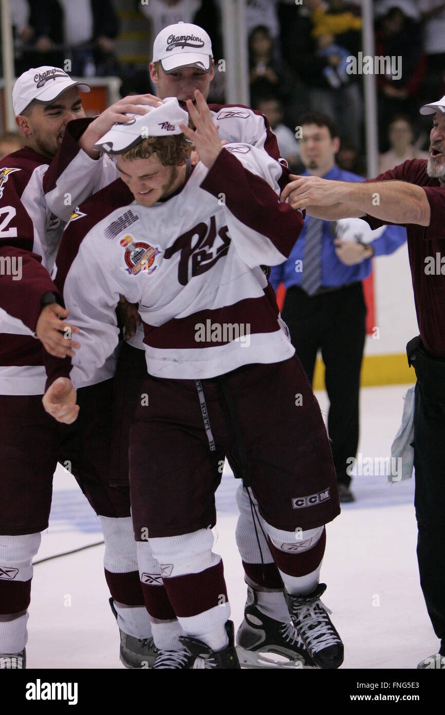 Daniel Ryder gets a hand full from his teammates as he wins the OHL ...