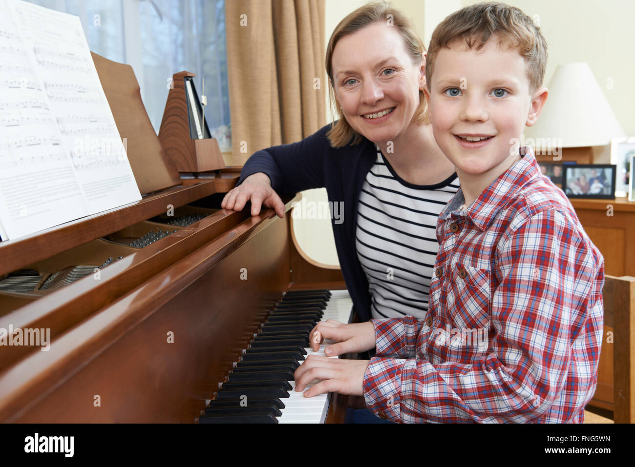 Music lesson piano teacher hi-res stock photography and images - Alamy