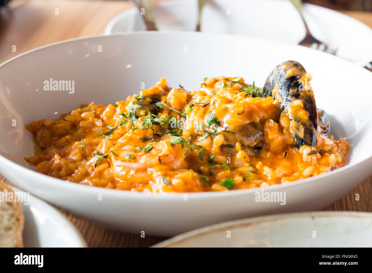 Paella with seafood and salad hi-res stock photography and images - Alamy