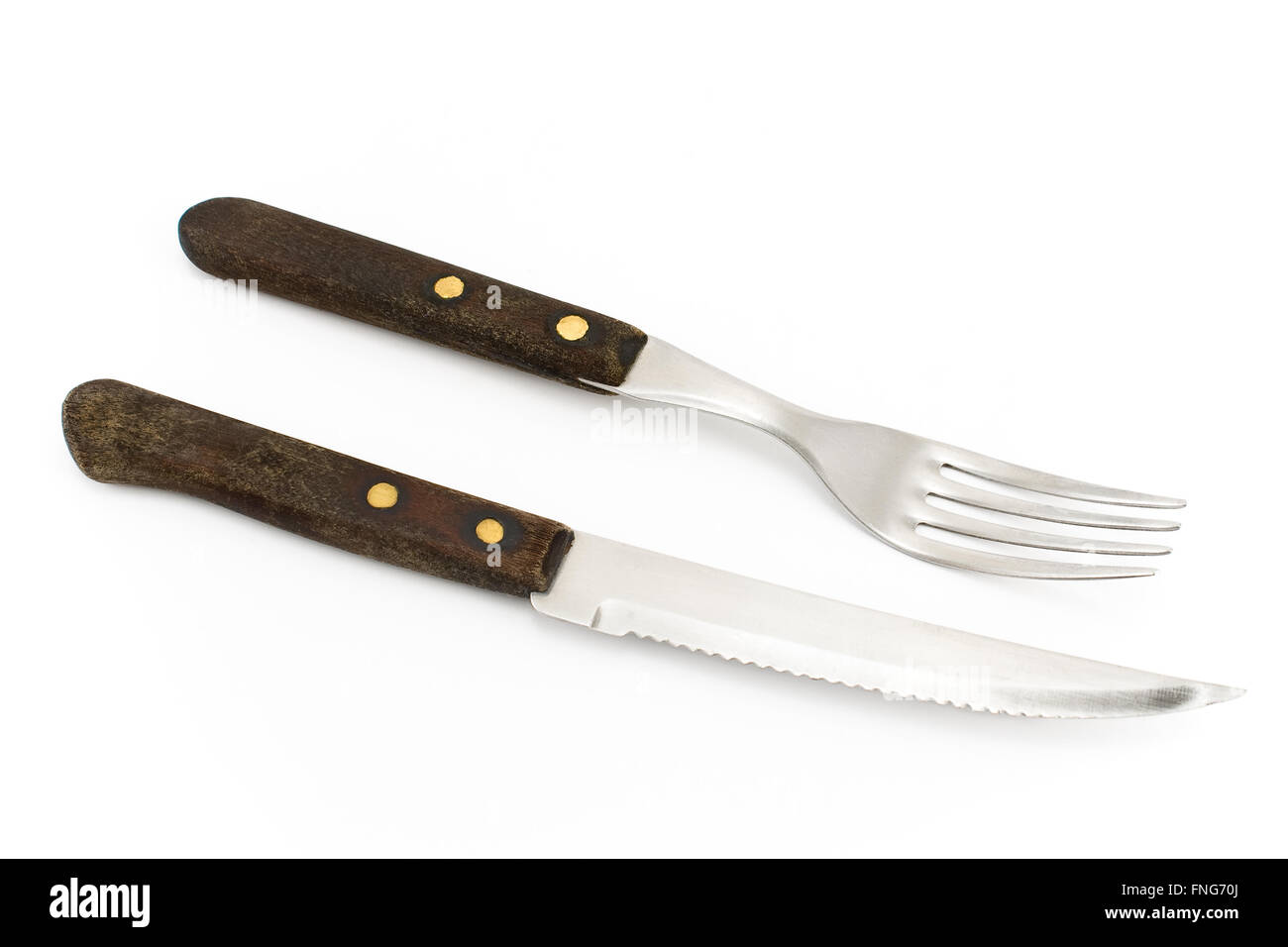 Fork and knife isolated on white Stock Photo - Alamy