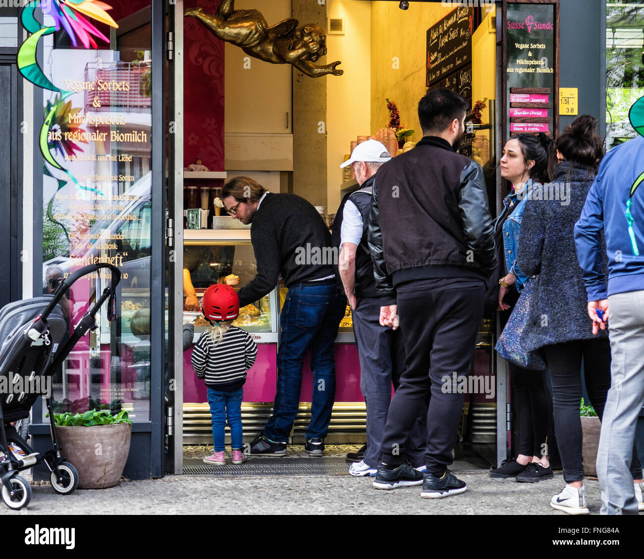 Berlin Ice cream shop. Father, child, man, woman, couple, senior man ...