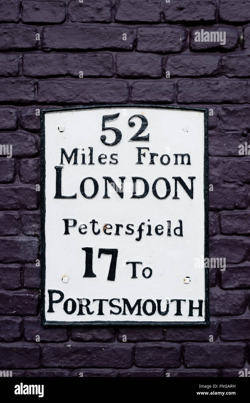 Old coaching distance sign between London and Portsmouth, located in ...