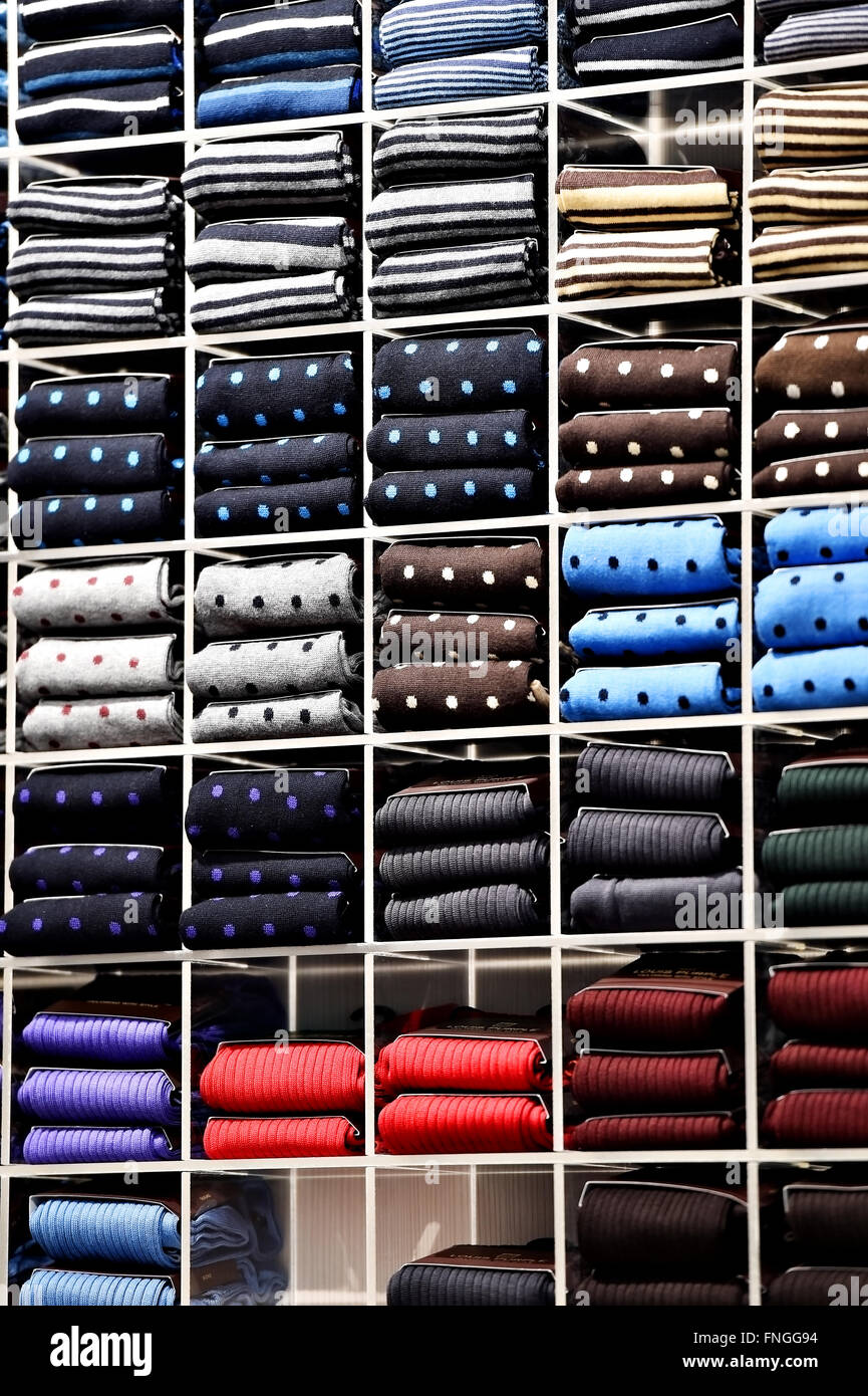 Different silk neckties packed on shelves in a store Stock Photo - Alamy
