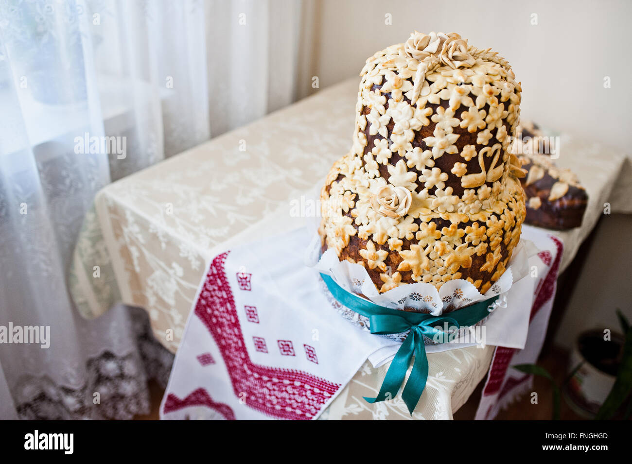 Wedding cake loaf with green velvet ribbon Stock Photo - Alamy