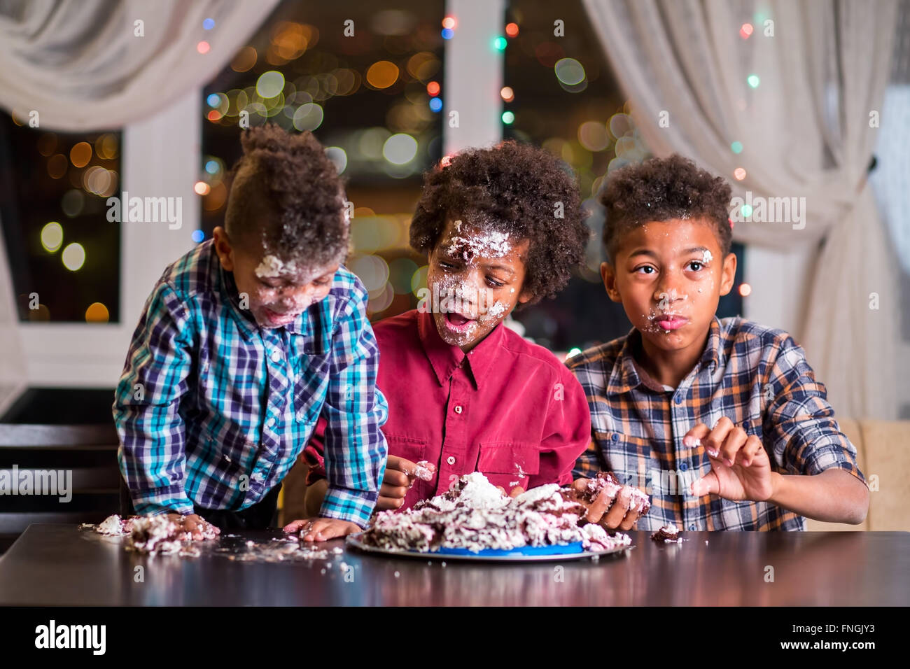 Black kids smashed a cake Stock Photo - Alamy