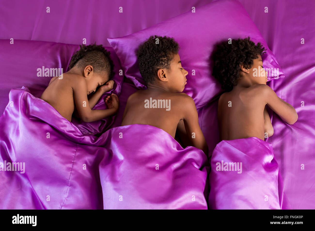 Boys sleeping on left side Stock Photo - Alamy