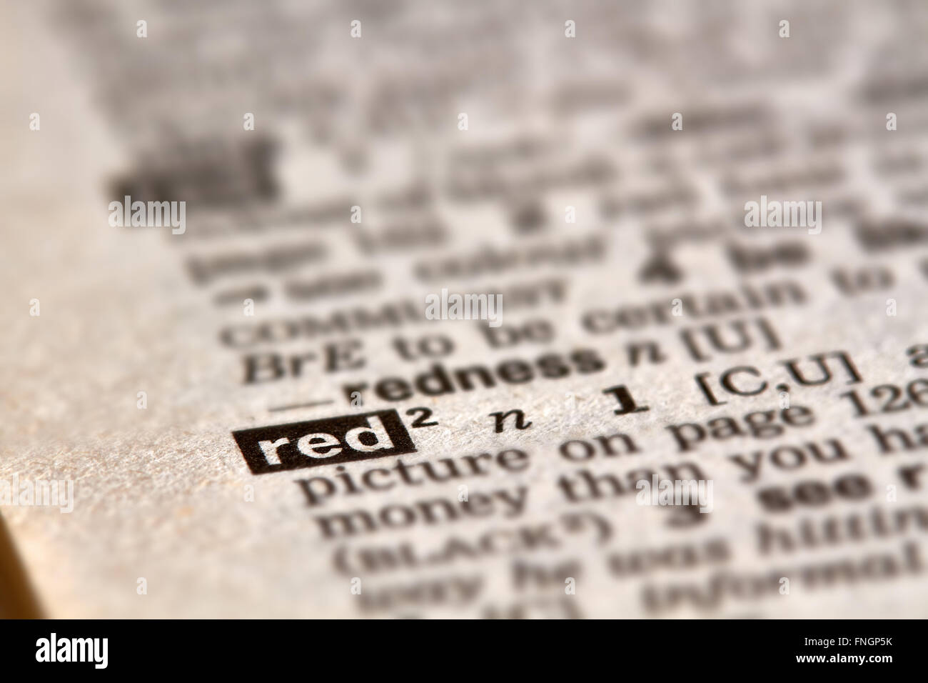 Red Word Definition Text in Dictionary Page Stock Photo - Alamy