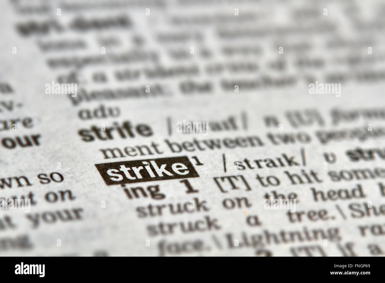 Strike Word Definition Text in Dictionary Page Stock Photo - Alamy