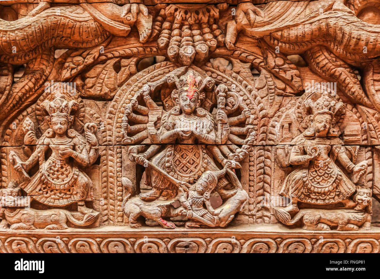 Beautiful ancient carved wood close up with many arms god Stock Photo ...