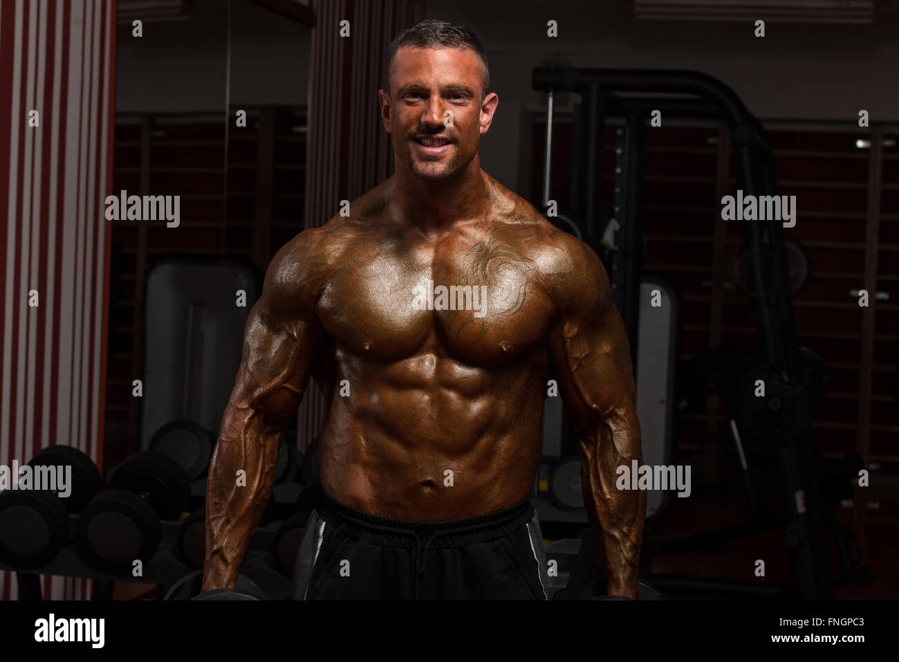 Bodybuilder Working Out Biceps - Dumbbell Concentration Curls - Best ...