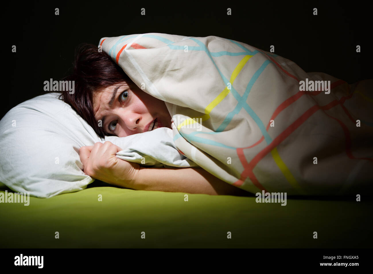 Scared of the dark bed woman hi-res stock photography and images - Alamy