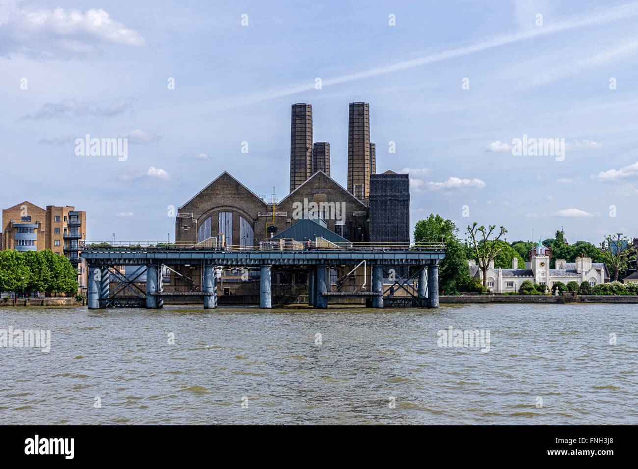 Greenwich Power station and old coal jetty pier on the river Thames ...
