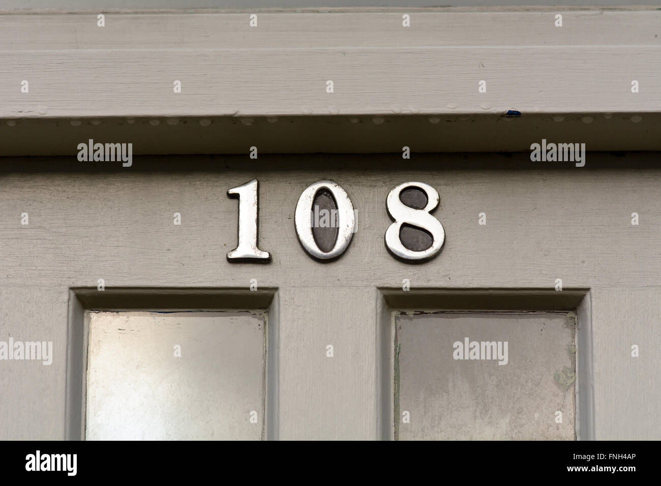 House number 108 sign on door Stock Photo - Alamy