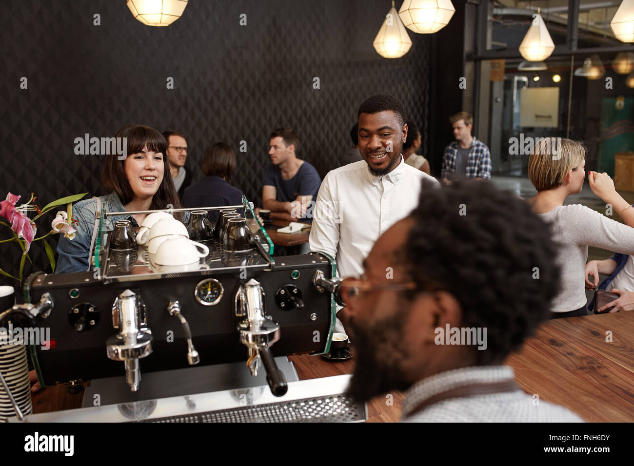 Ordering coffee counter hi-res stock photography and images - Alamy