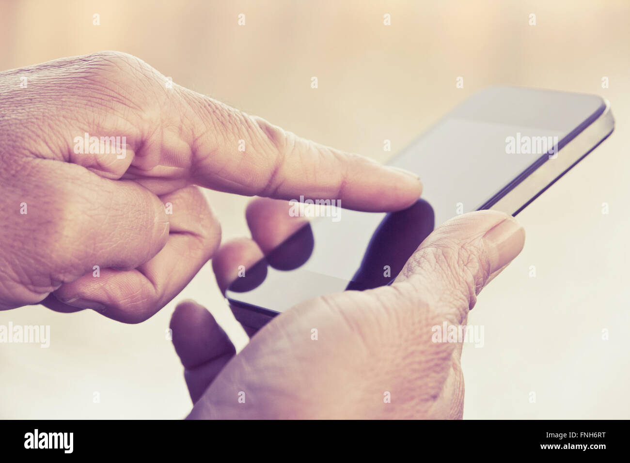 Image of man texting on his smartphone Stock Photo - Alamy
