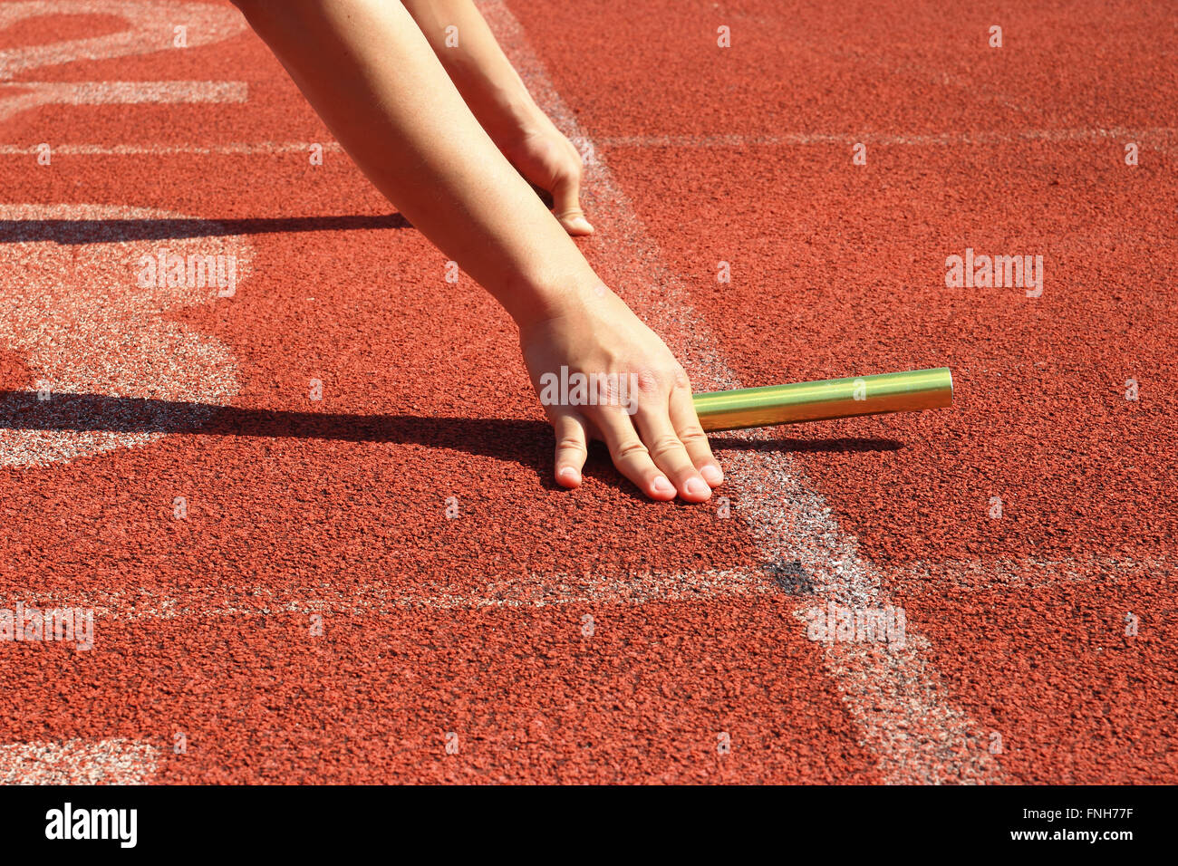 Athlete in the starting blocks, ready to go Stock Photo - Alamy