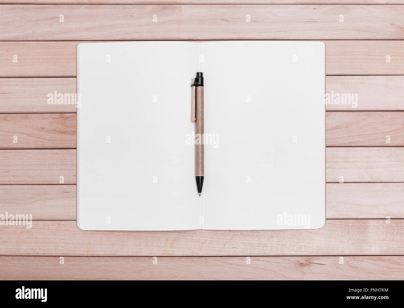 Notebooks on the background of wooden boards Stock Photo - Alamy