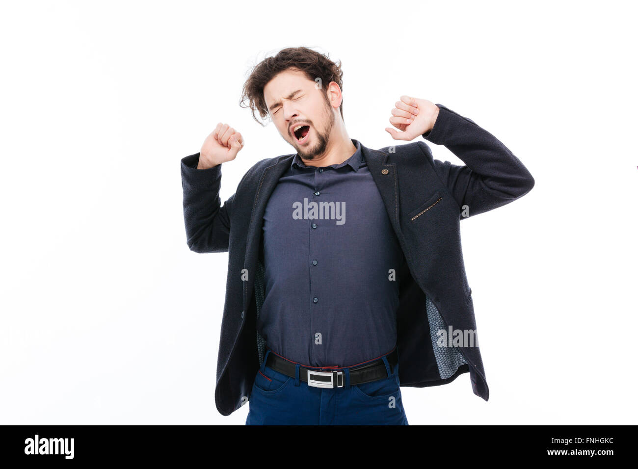 Young businessman yawning isolated on a white background Stock Photo ...