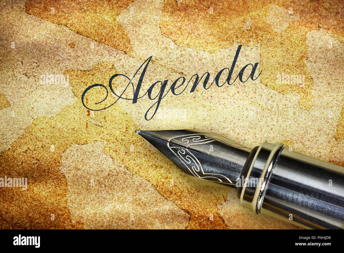 Closeup of the nib of a fountain pen and word Agenda Stock Photo - Alamy