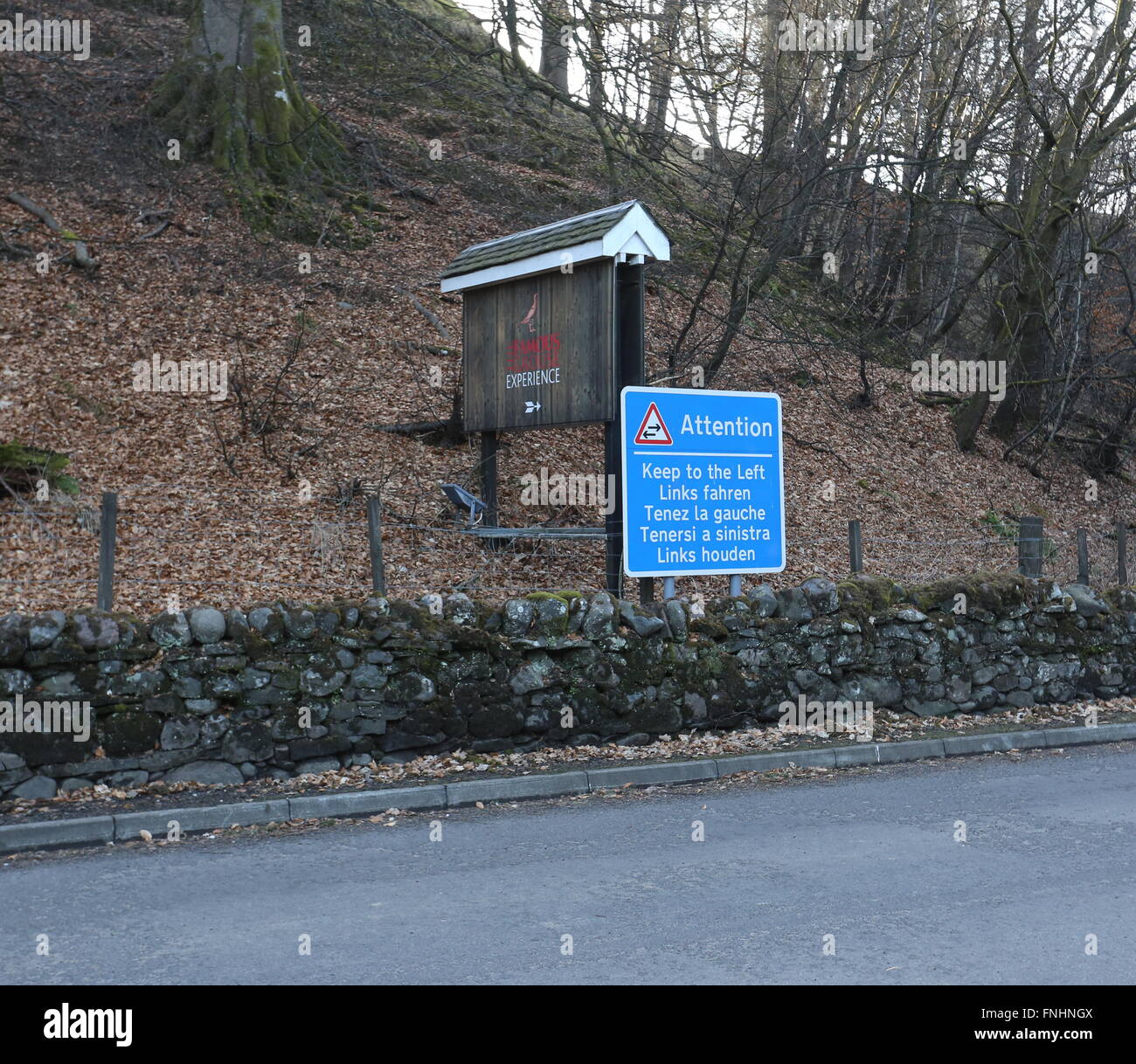 Multilingual keep to the left sign at Famous Grouse Experience Crieff ...