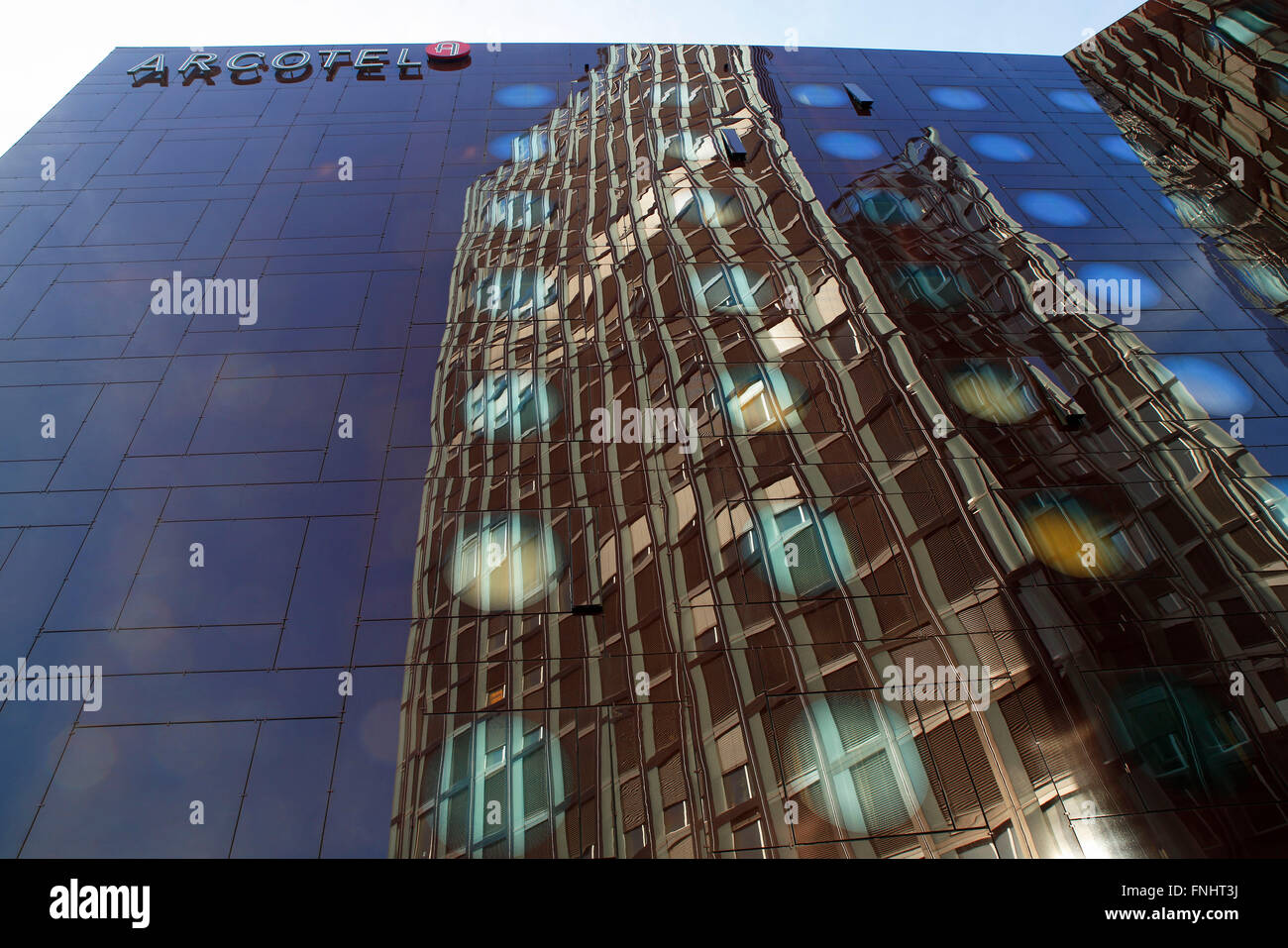 Office building dancing towers mirrored in facade hi-res stock ...
