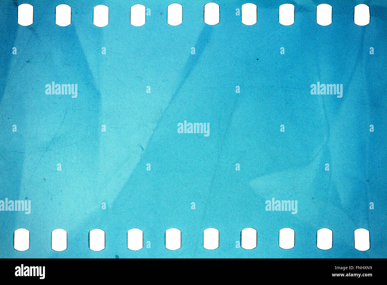 Blank crumpled noisy blue film strip texture background Stock Photo - Alamy