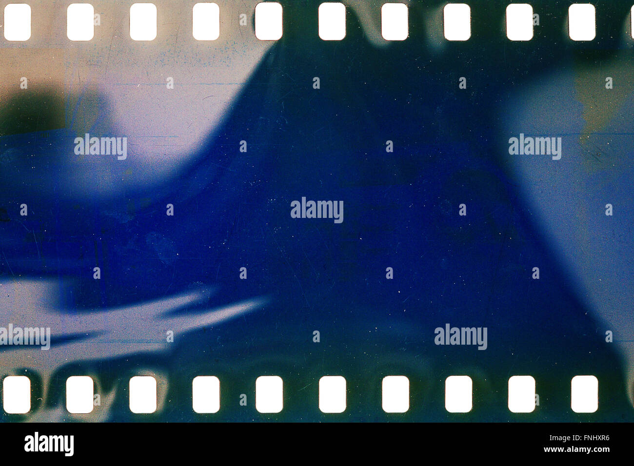 Blank crumpled noisy blue film strip texture background Stock Photo - Alamy