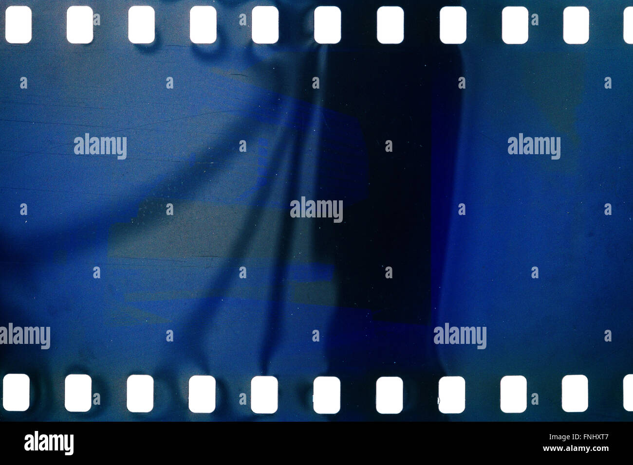 Blank crumpled noisy blue film strip texture background Stock Photo - Alamy