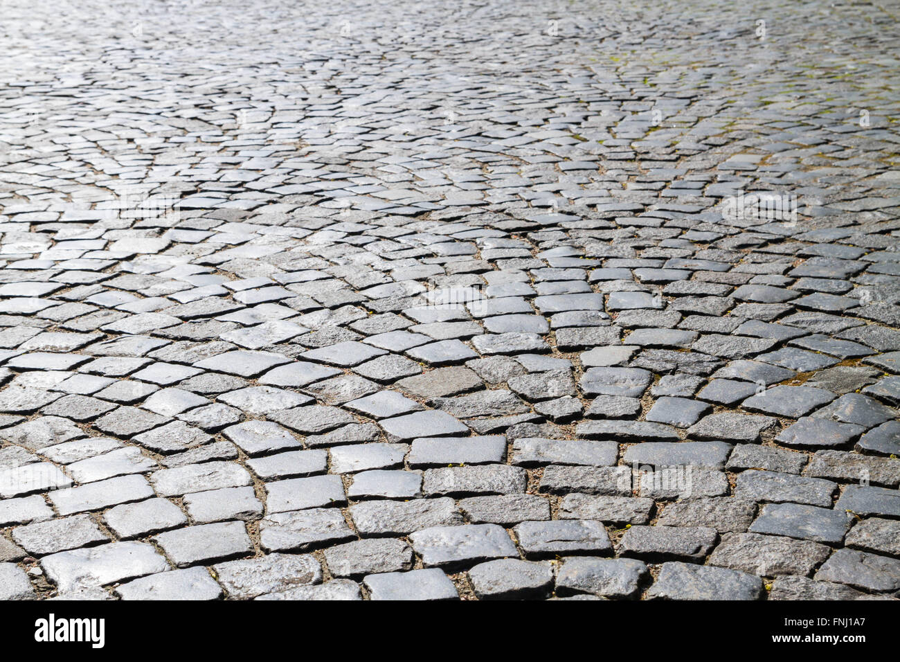 The road is paved with large stone Stock Photo - Alamy