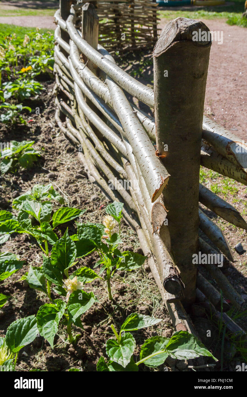 A makeshift fence of twigs and sticks Stock Photo - Alamy