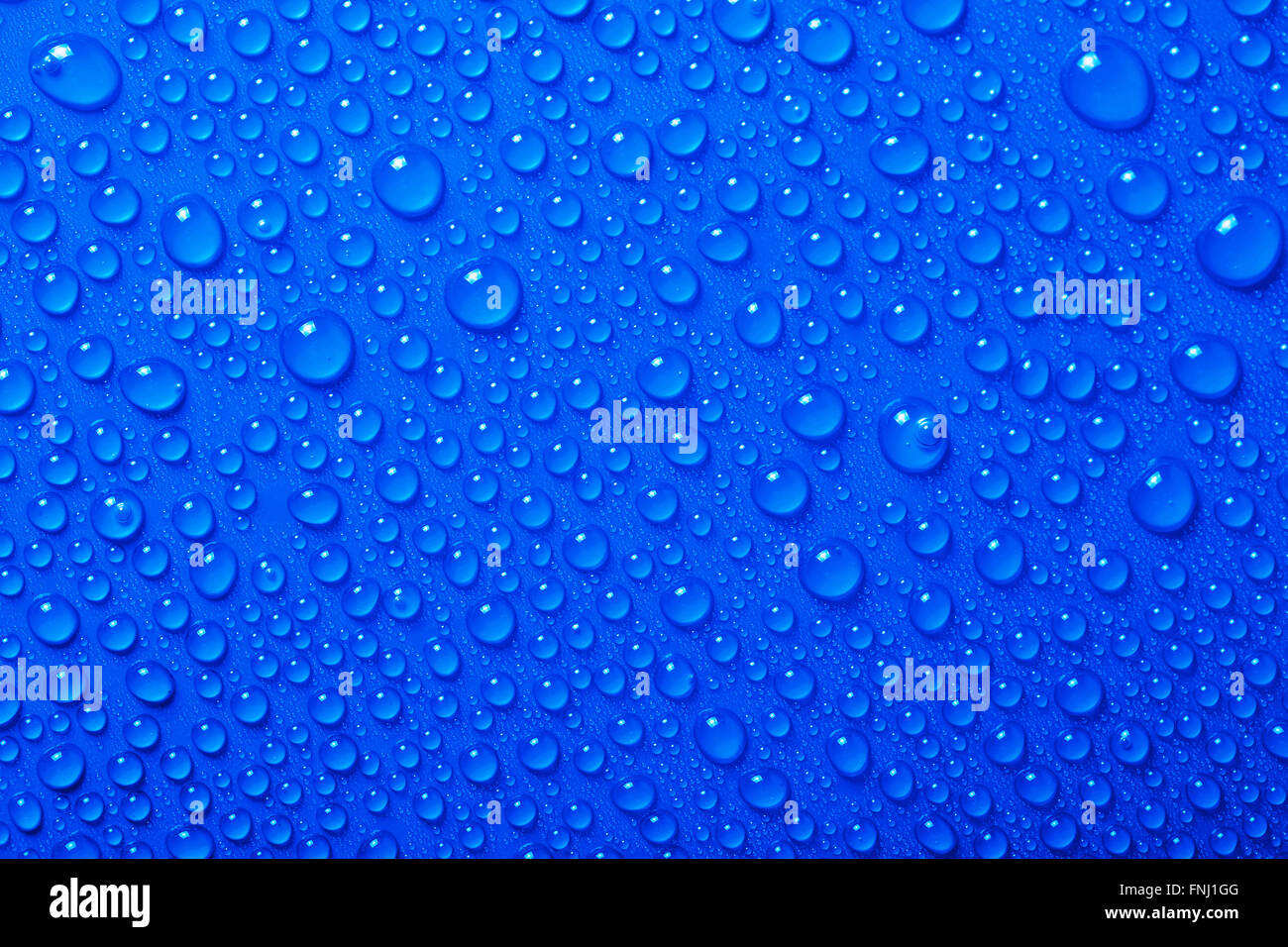 clean blue waterdrops macro background Stock Photo - Alamy