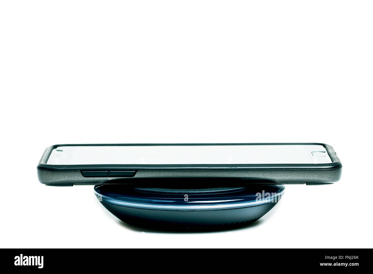 Wireless fast charger with smartphone blue black color on isolated ...