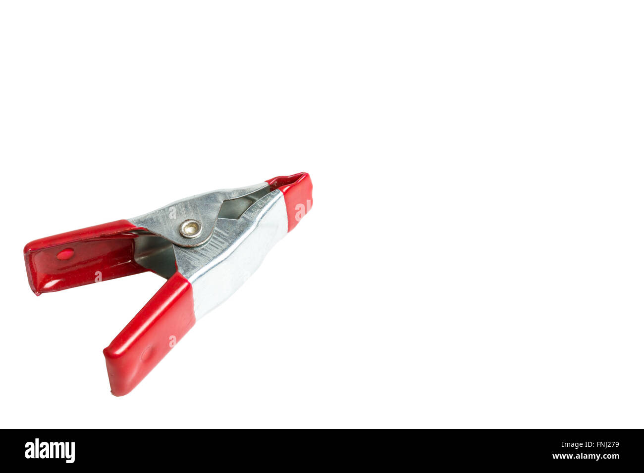 Macro clip red color isolated on white background Stock Photo - Alamy